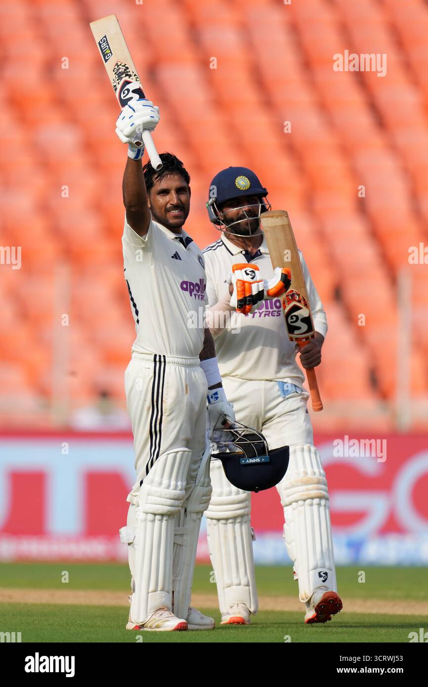 India's Dhruv Jurel, left, celebrates after scoring a century on the ...