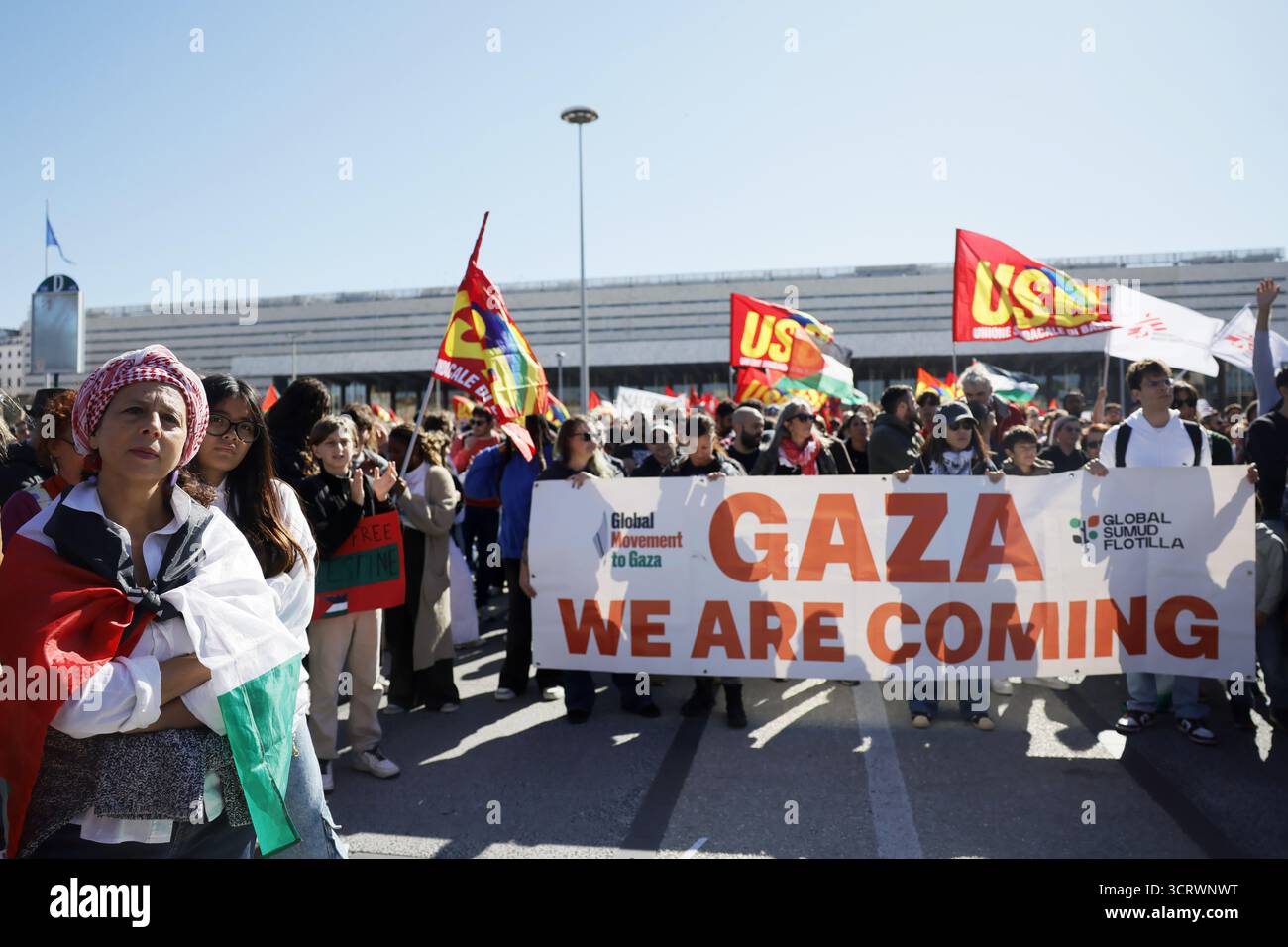 Demonstrators march during general strike in solidarity with the ...
