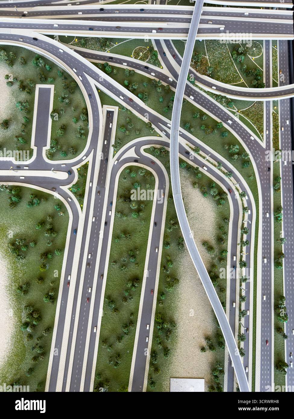 Aerial view of modern highway interchange with green landscaping and ...
