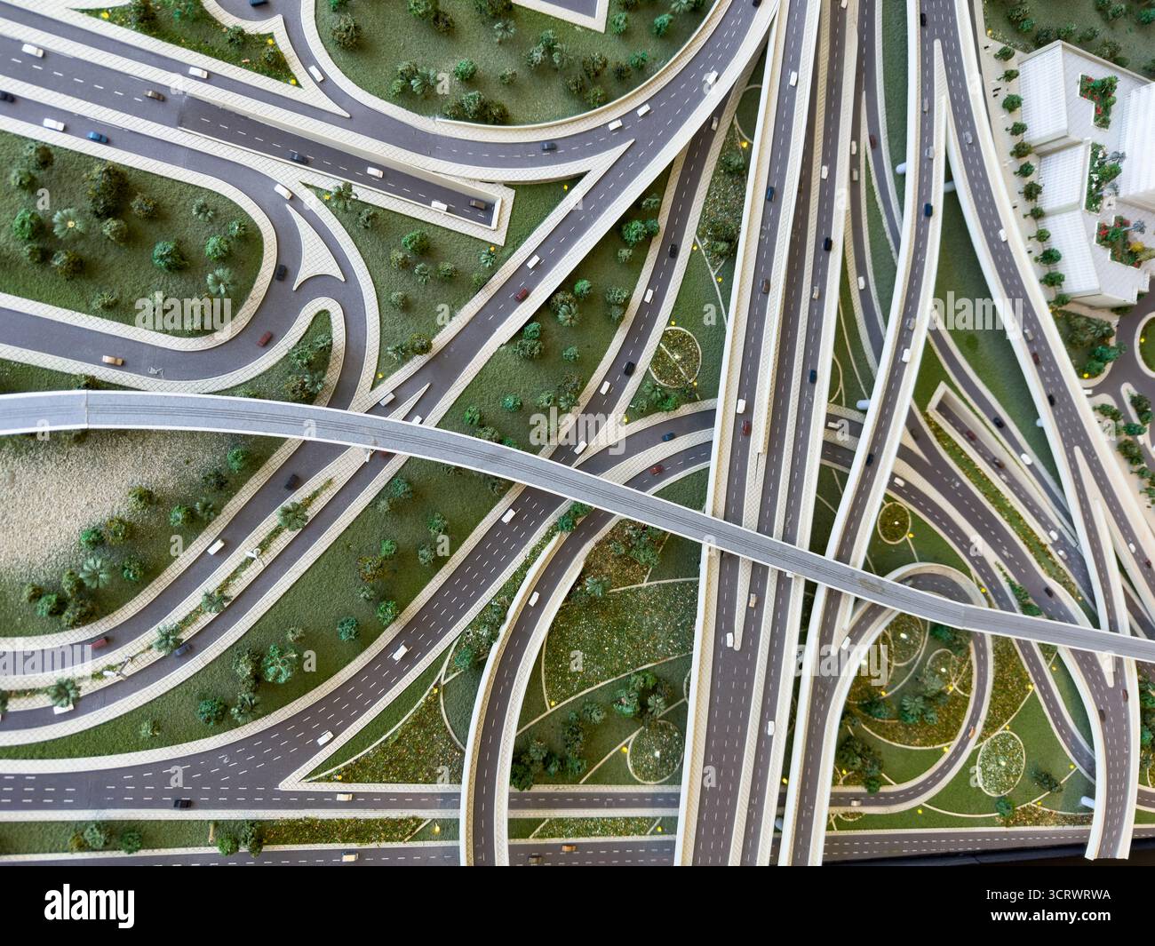 Aerial view of modern highway interchange with green landscaping and ...