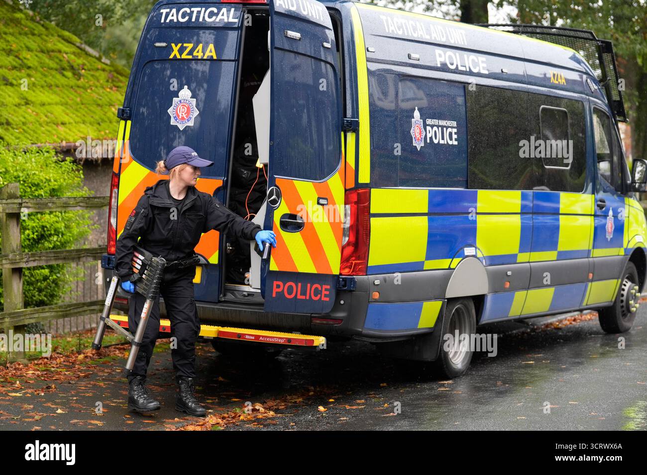 Members of the Police Tactical Aid Unit arrive at Langley Crescent ...