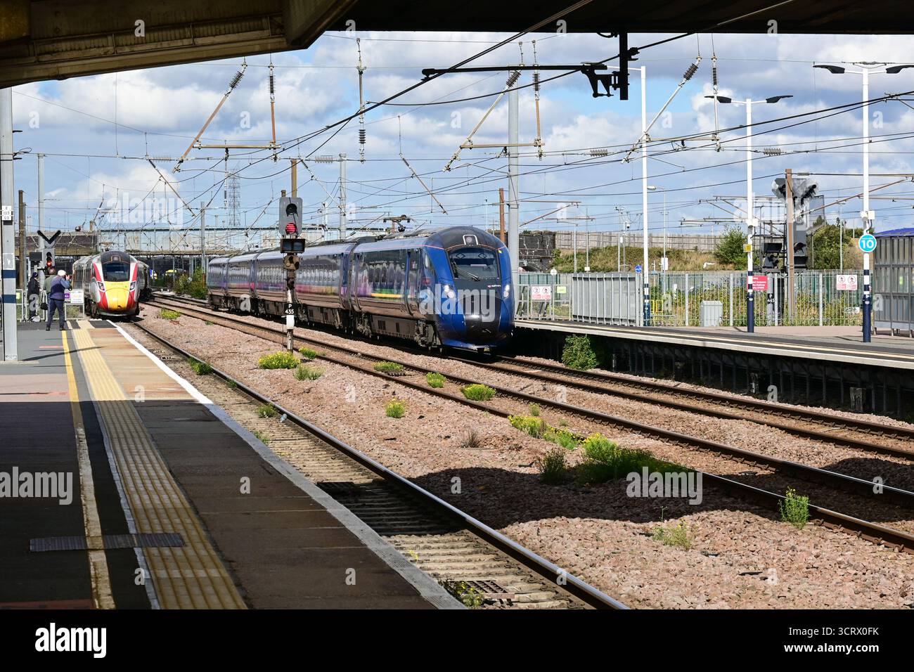 Hull Trains class 802 Paragon bi-mode multiple unit passes an LNER ...