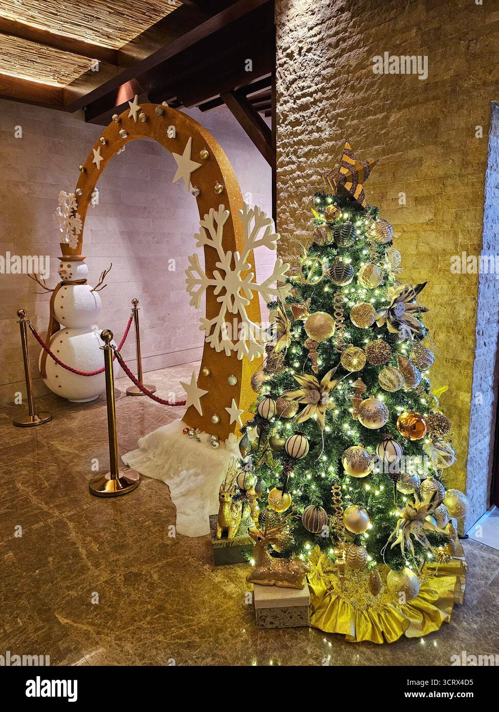 An Elegant Christmas Tree in an Opulent Lobby Stock Photo - Alamy