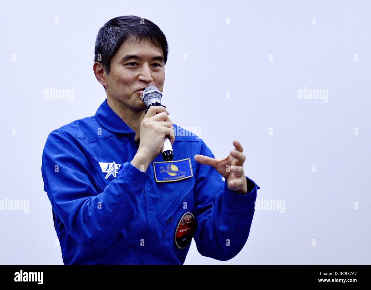 Japanese astronaut Takuya Onishi speaks at a press conference in Tokyo ...