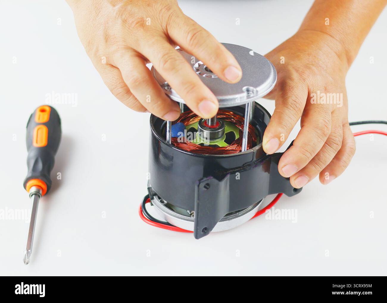 Assembling repairing electric motor hi-res stock photography and images ...