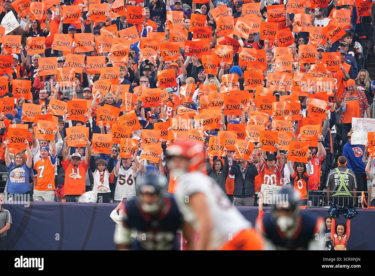 Fans of the Denver Broncos hold up 5280 signs during the Denver Broncos ...