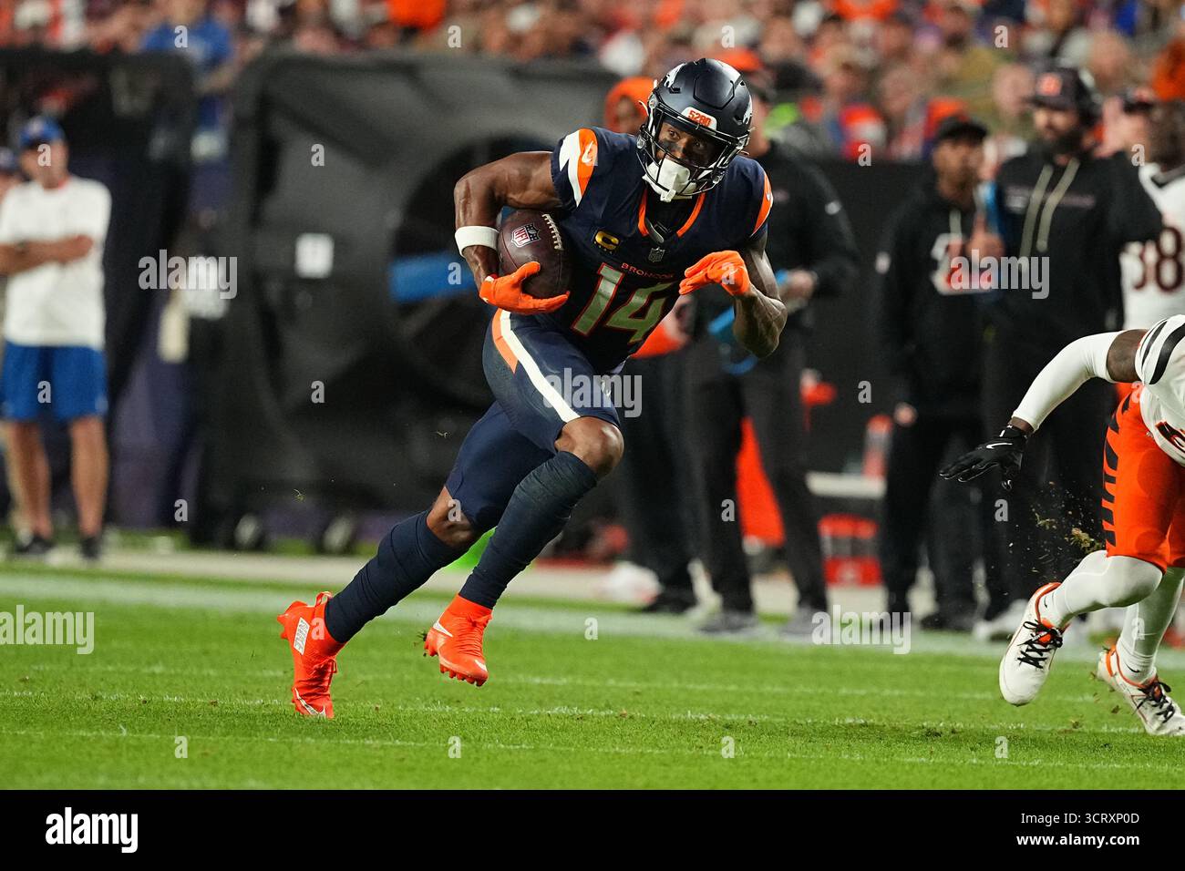 Denver Broncos wide receiver Courtland Sutton (14) runs after the catch ...