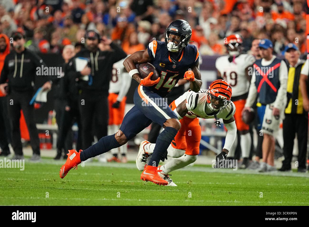 Denver Broncos wide receiver Courtland Sutton (14) runs after the catch ...