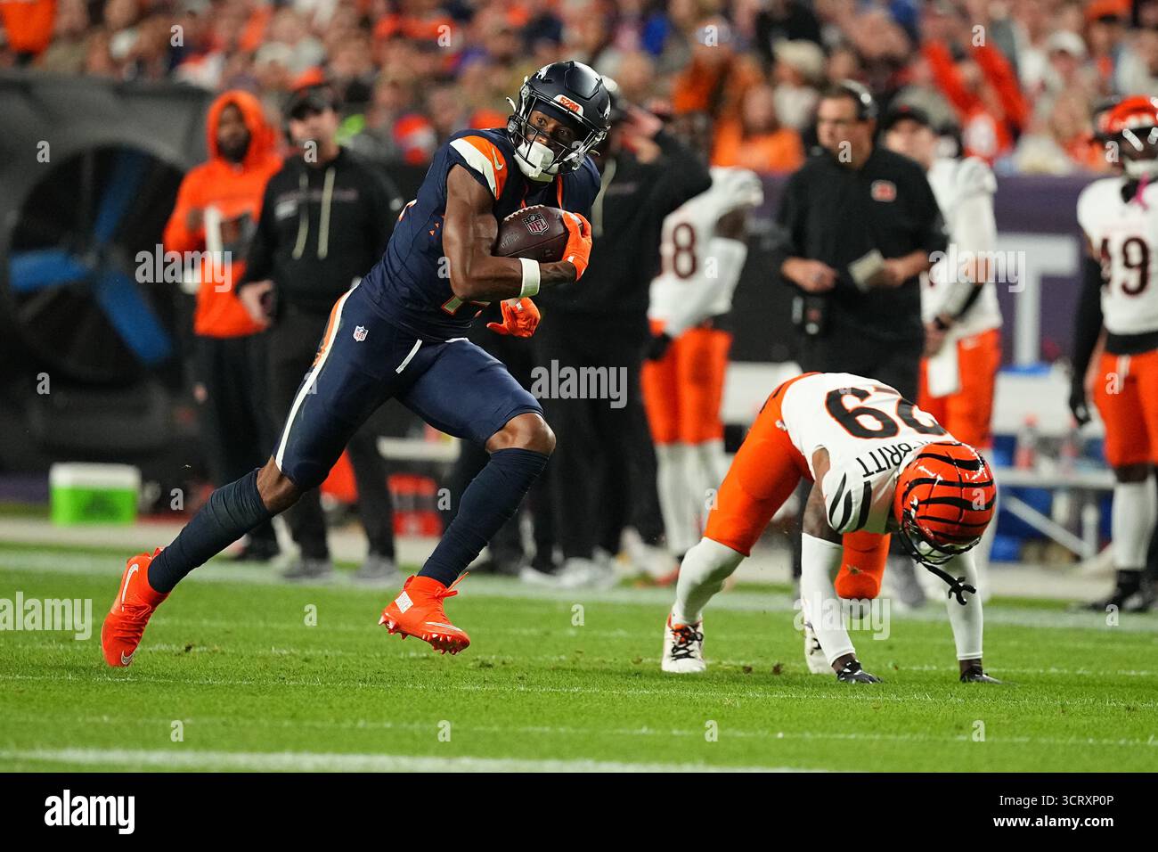 Denver Broncos wide receiver Courtland Sutton (14) runs after the catch ...