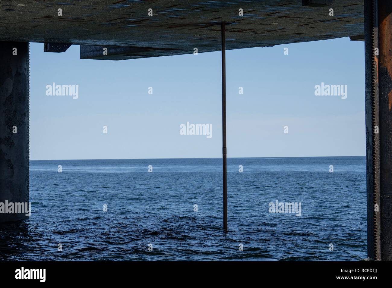 The wireline drilling core barrel is visible from underside of the ...