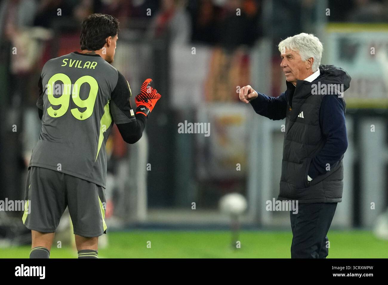 Mile Svilar of AS Roma and Gian Piero Gasperini, head coach of AS Roma ...