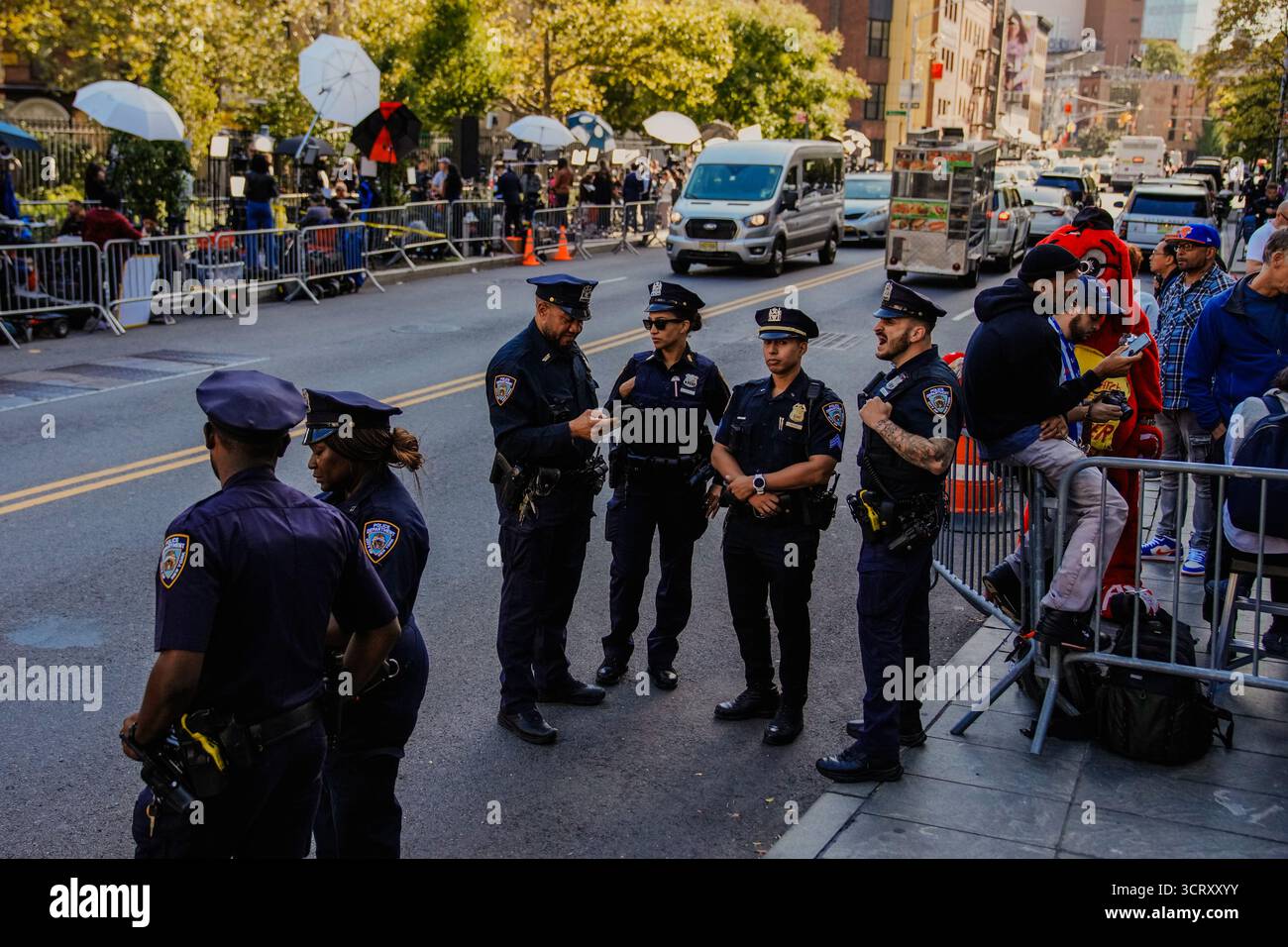 NYPD officers stand guard in front of the Manhattan federal court for ...
