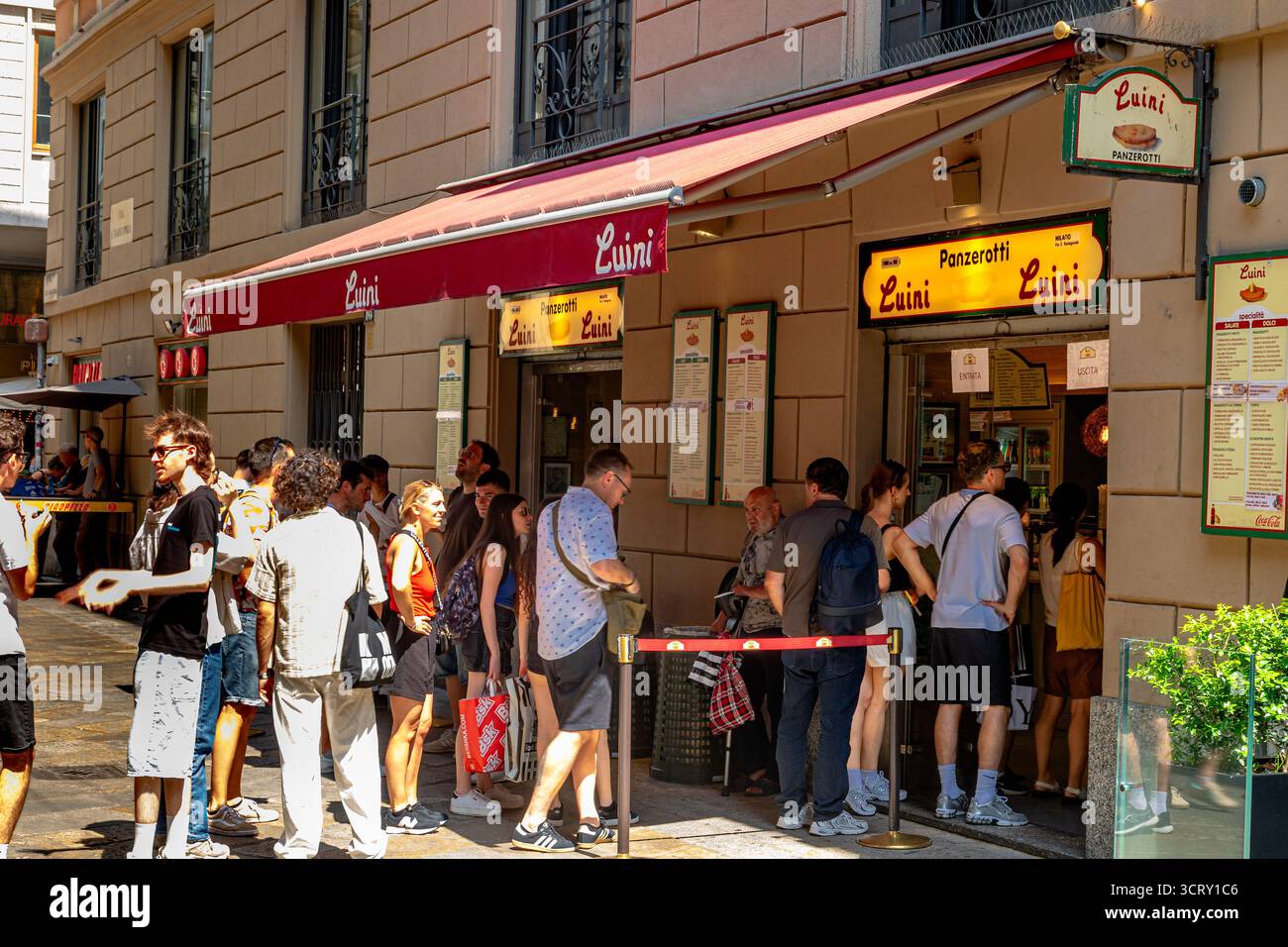 People queuing up to buy Panzerotti at Luini on Via Santa Radegonda ...