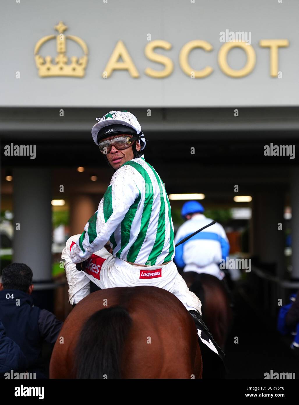 Jockey Sean Levey enters the parade ring after victory in the Victoria ...