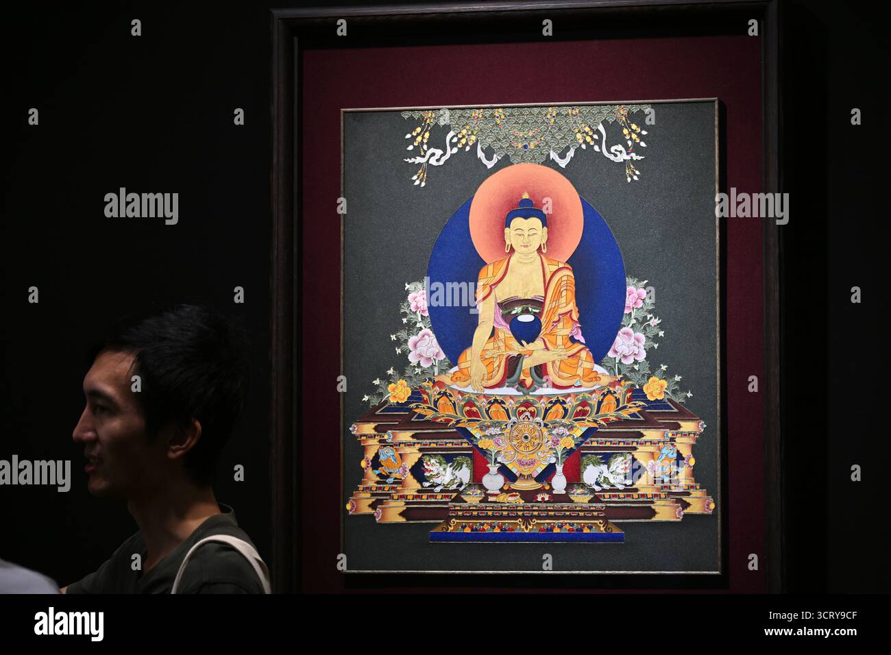 Thangka with gold-thread embroidery display at Fine Art Asia 2025 on ...