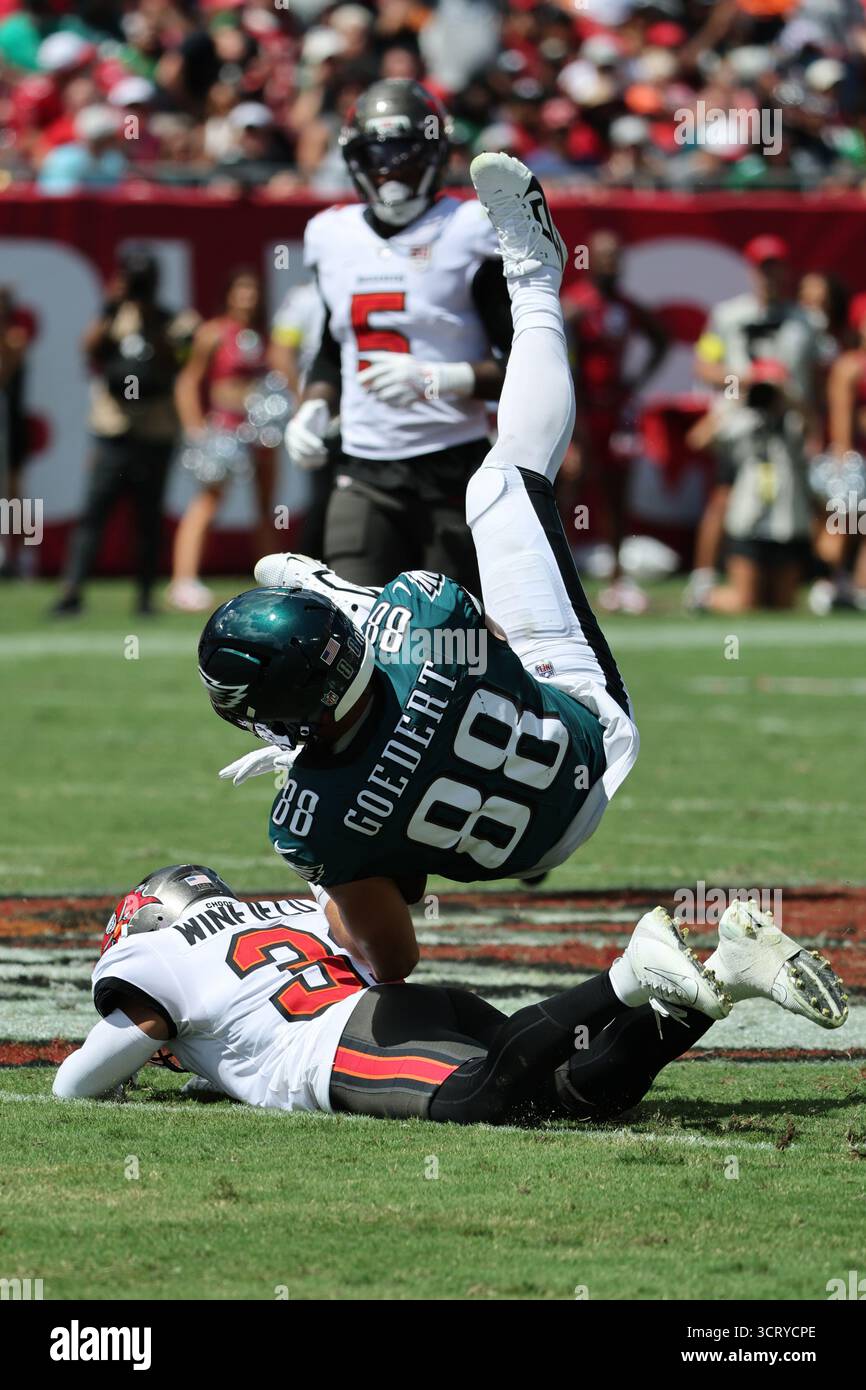Philadelphia Eagles tight end Dallas Goedert (88) is upended by Tampa Bay Buccaneers safety ...