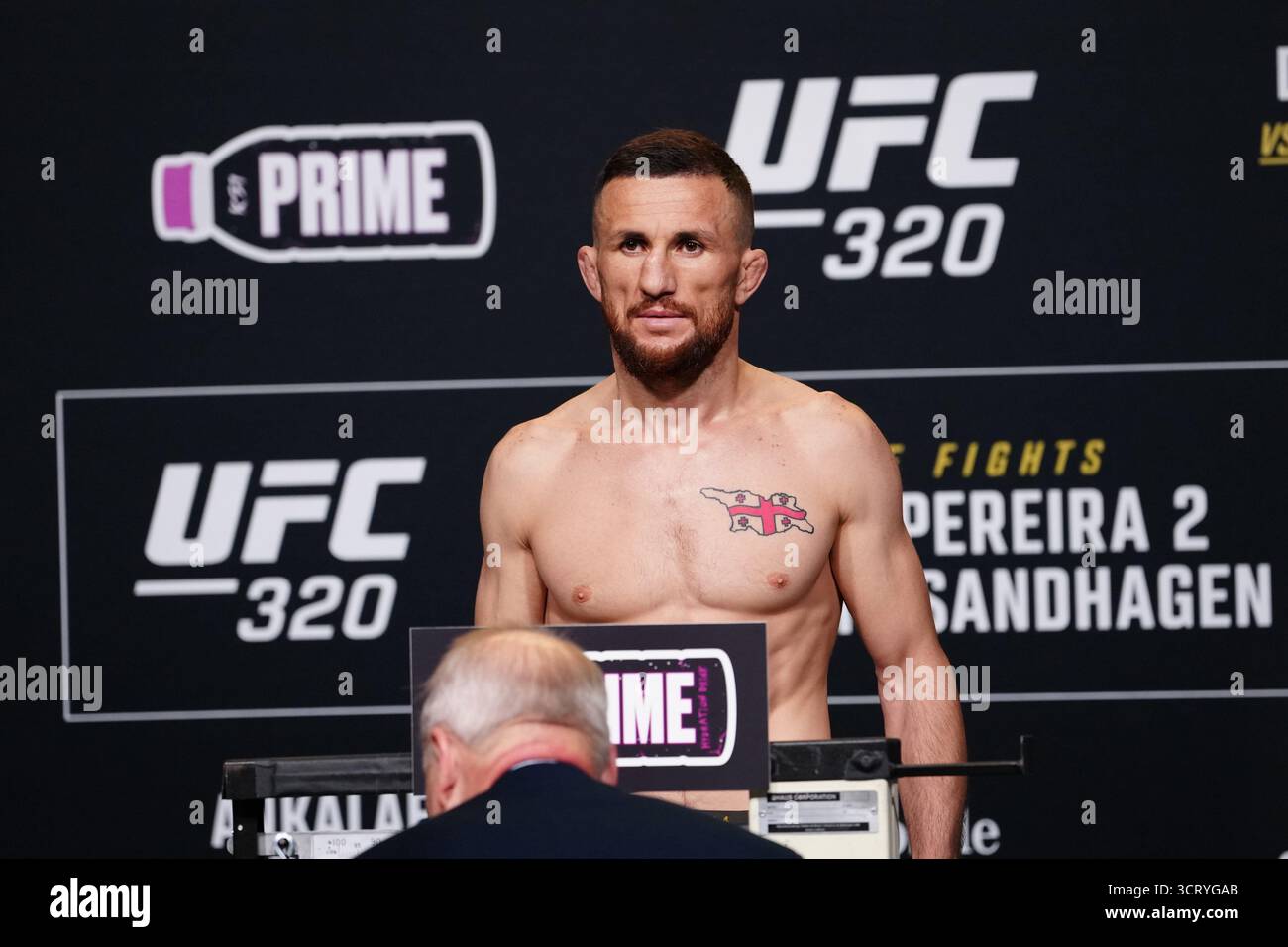 LAS VEGAS, NV - OCT 3:Merab Dvalishvili steps on the scale for the ...