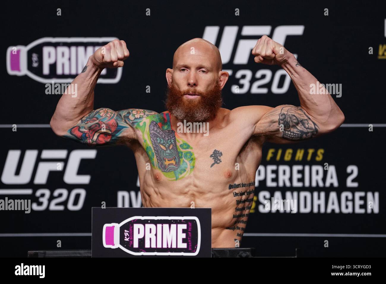 LAS VEGAS, NV - OCT 3:Josh Emmett steps on the scale for the official ...