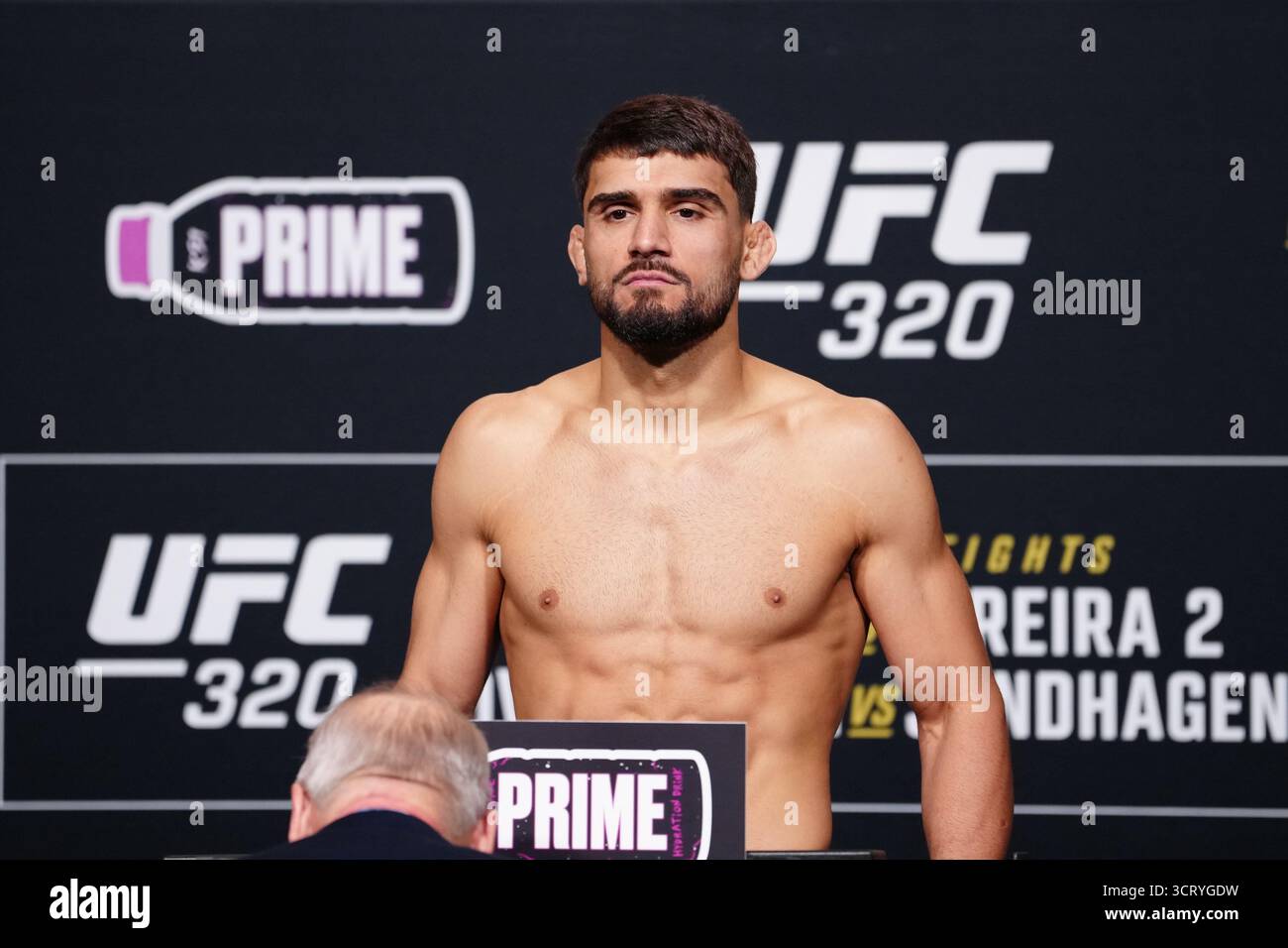 LAS VEGAS, NV - OCT 3:Ramiz Brahimaj steps on the scale for the ...