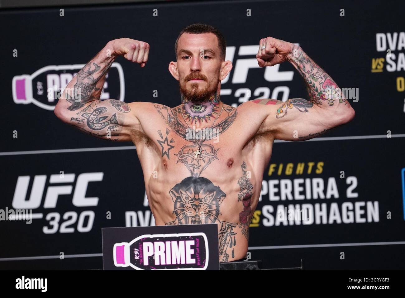 LAS VEGAS, NV - OCT 3:Austin Vanderford steps on the scale for the ...