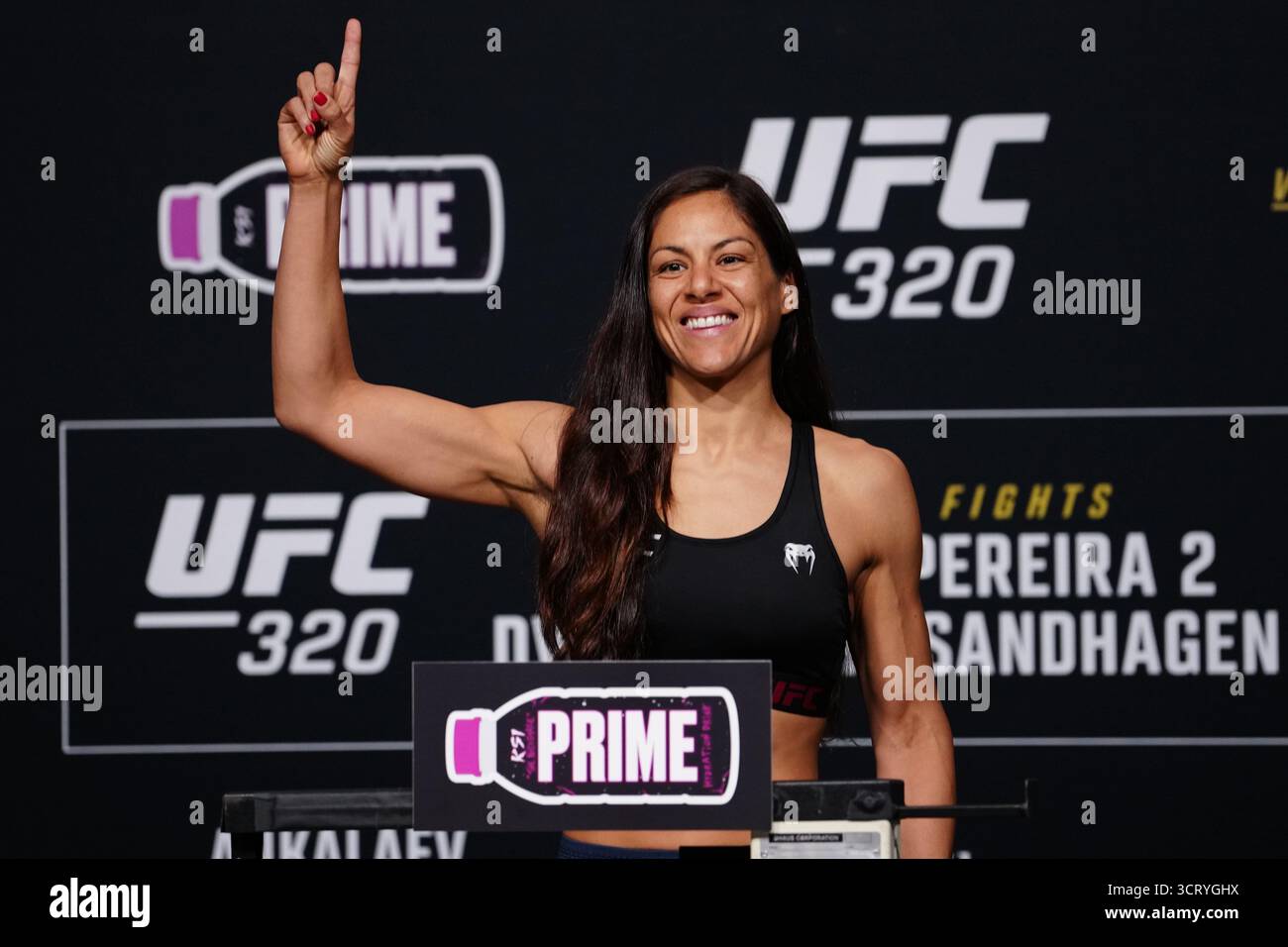 LAS VEGAS, NV - OCT 3:Brogan Walker steps on the scale for the official ...