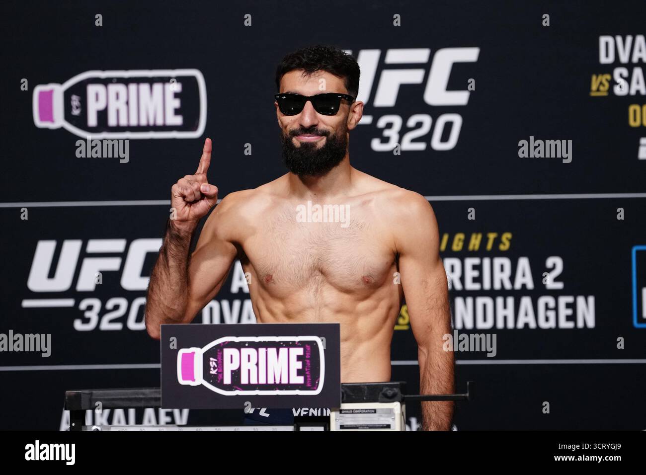 LAS VEGAS, NV - OCT 3:Farid Basharat steps on the scale for the ...