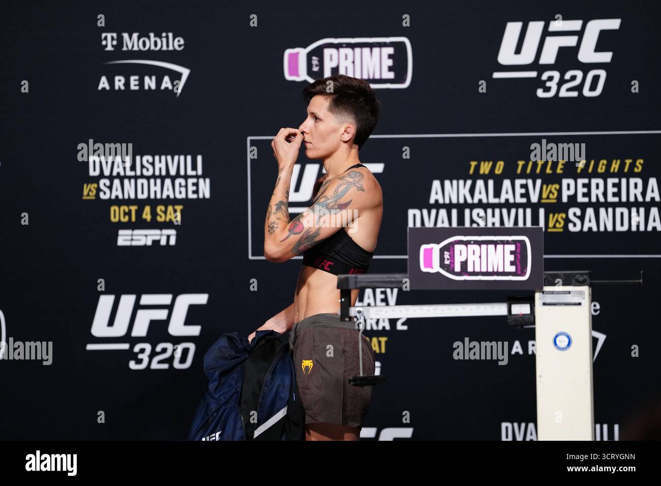 LAS VEGAS, NV - OCT 3:Macy Chiasson steps on the scale for the official ...