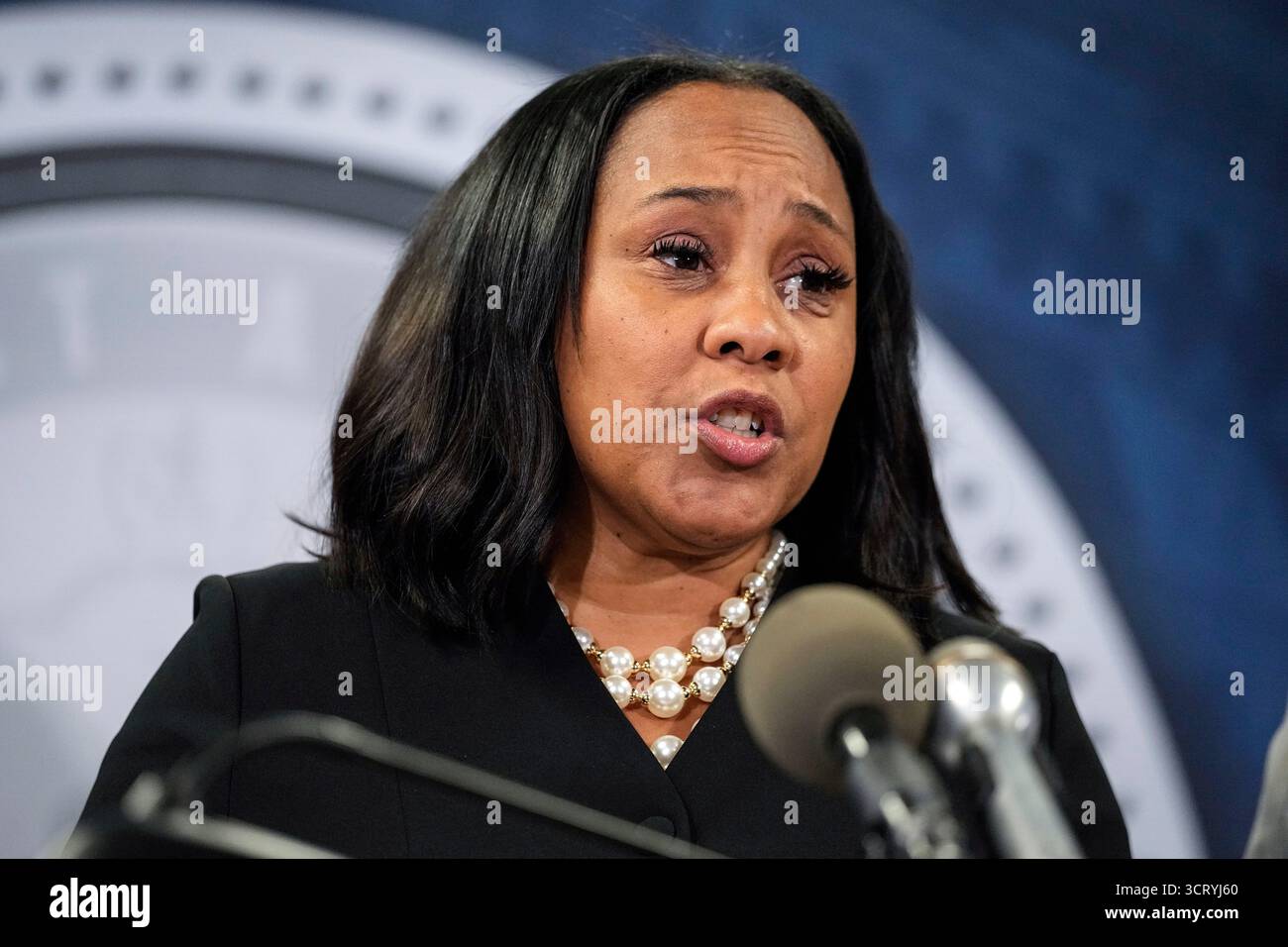 FILE - Fulton County District Attorney Fani Willis speaks during a news ...