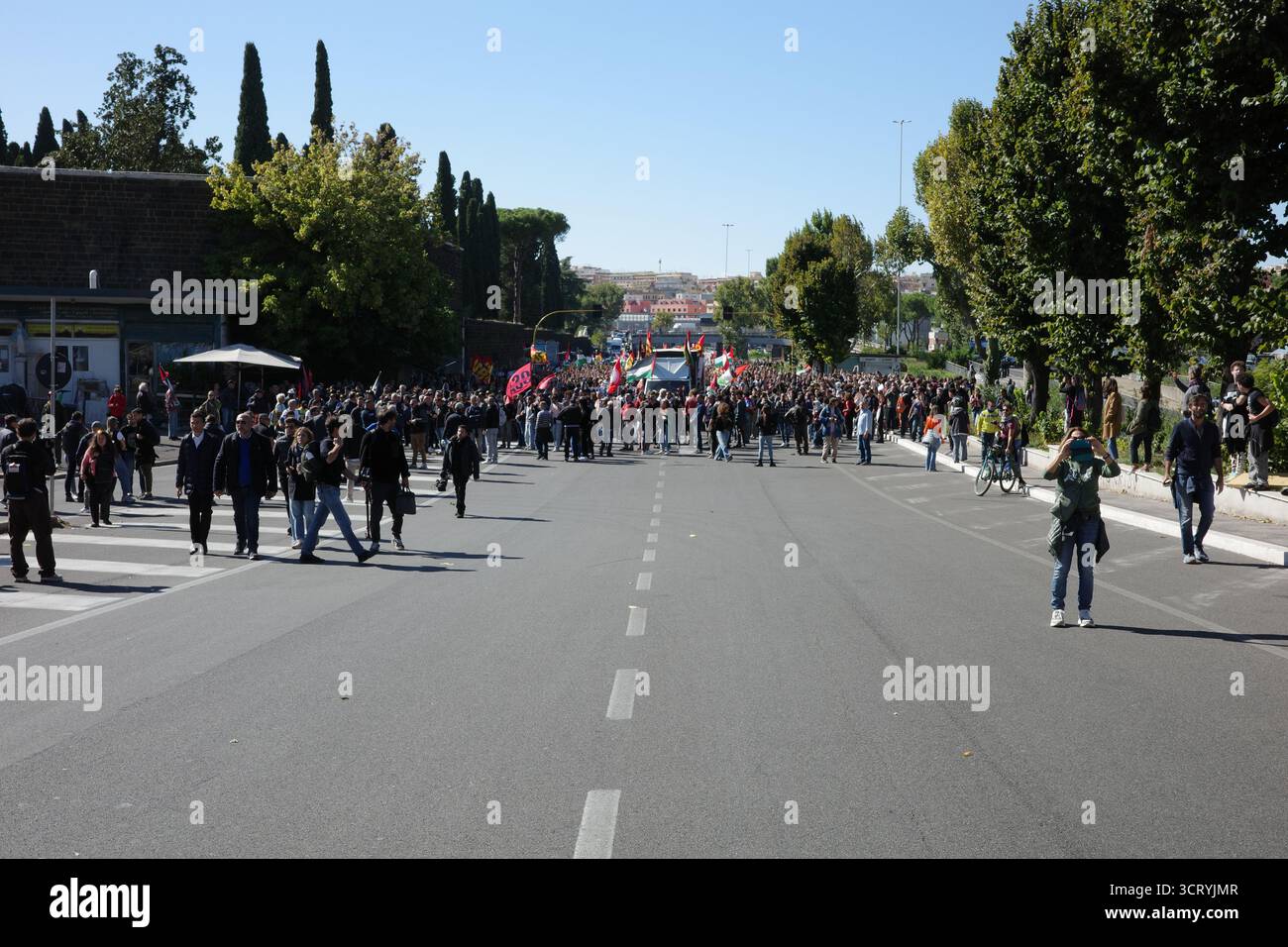 Rome, Italy. 03 October 2025. A large crowd marches through the streets ...