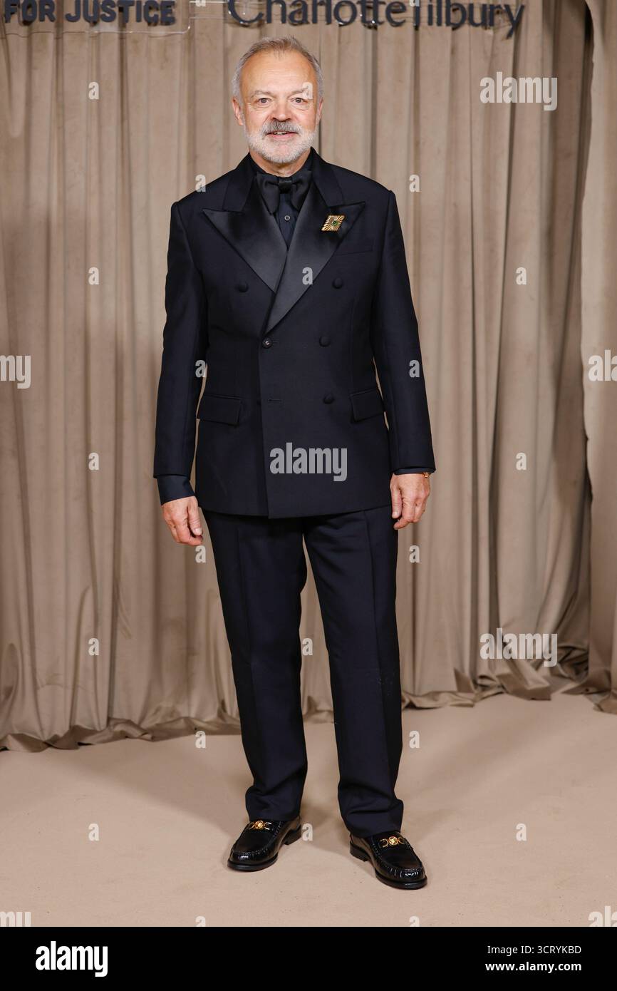 Graham Norton poses for photographers upon arrival at The Albies on ...