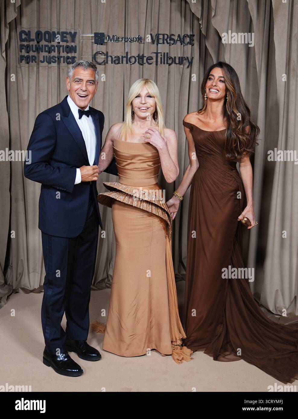 George Clooney, Donatella Versace and Amal Clooney arrive at the Albie ...