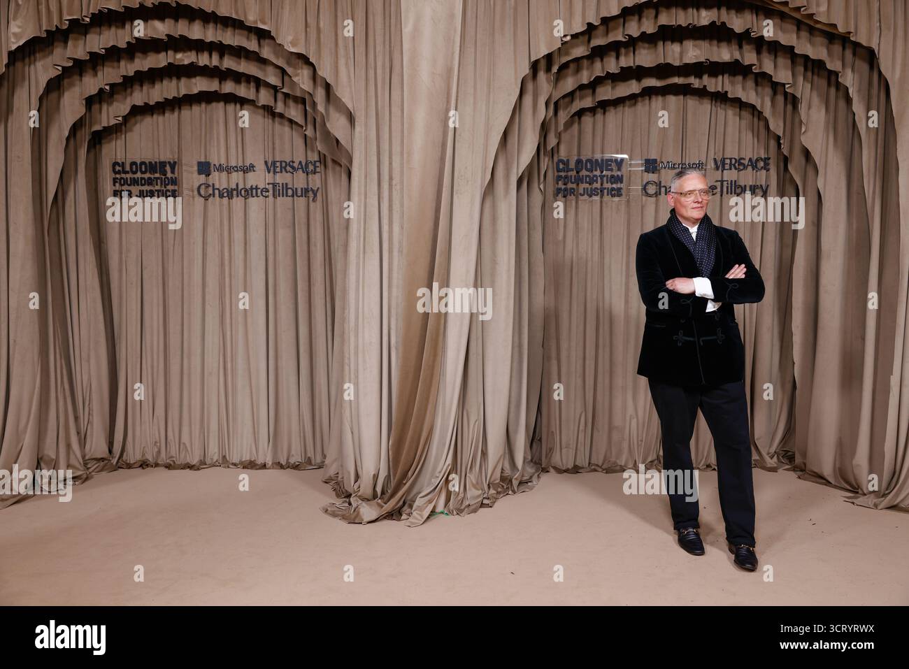 Giles Deacon poses for photographers upon arrival at The Albies on ...