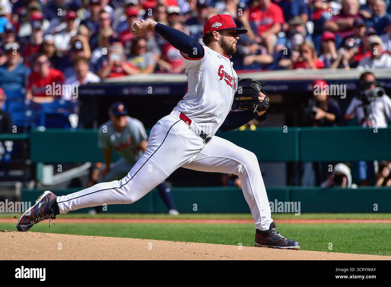 Cleveland Guardians starting pitcher Slade Cecconi delivers against the ...