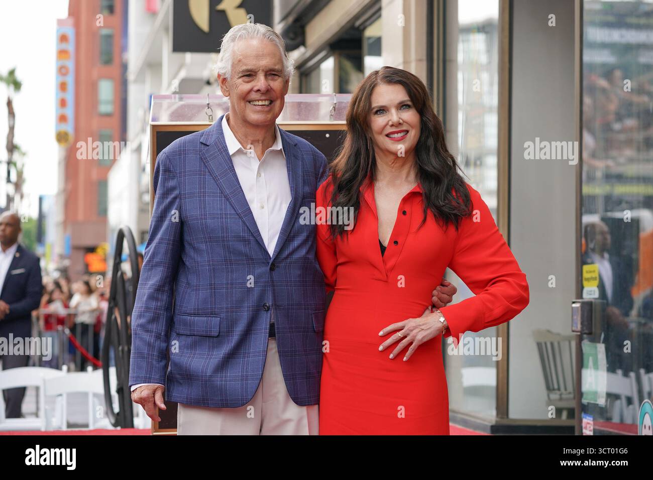 Larry Graham, left, and Lauren Graham pose with Graham's new star ...