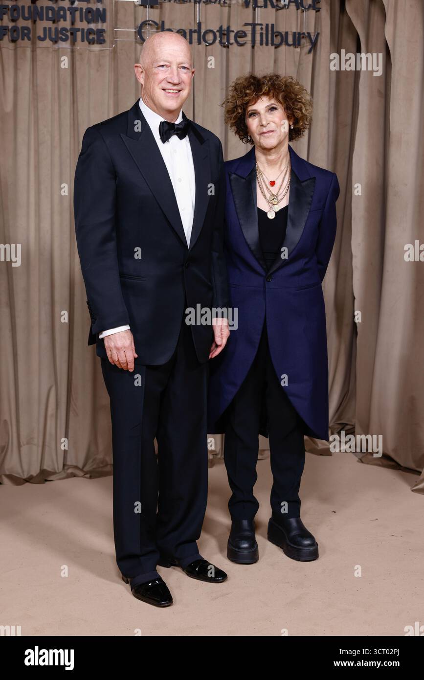 Bryan Lourd, left, and Amy Pascal pose for photographers upon arrival ...