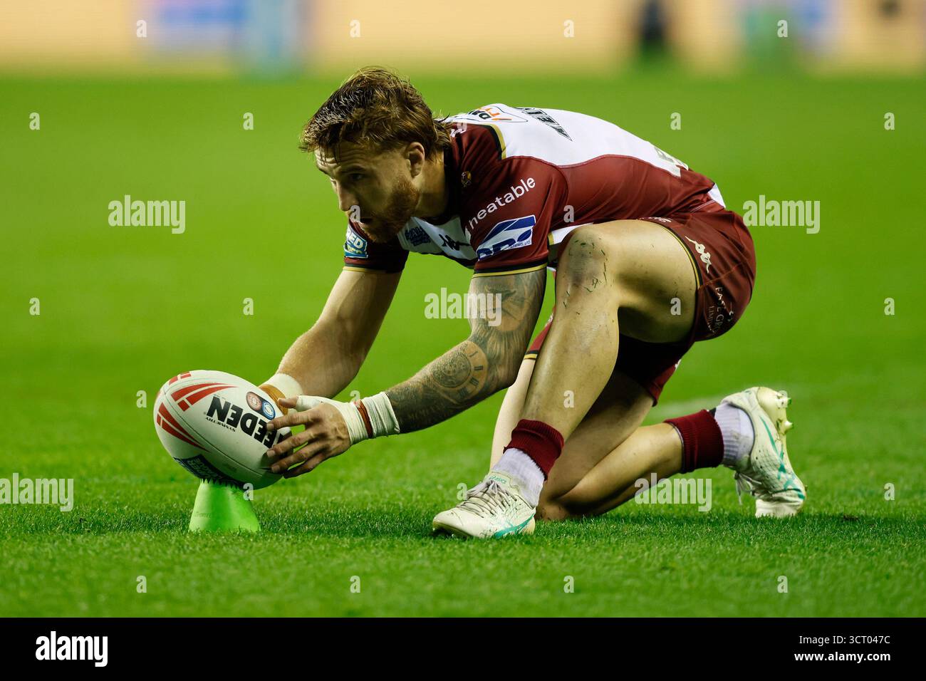 Wigan Warriors' Adam Keighran before scoring a conversion during the ...