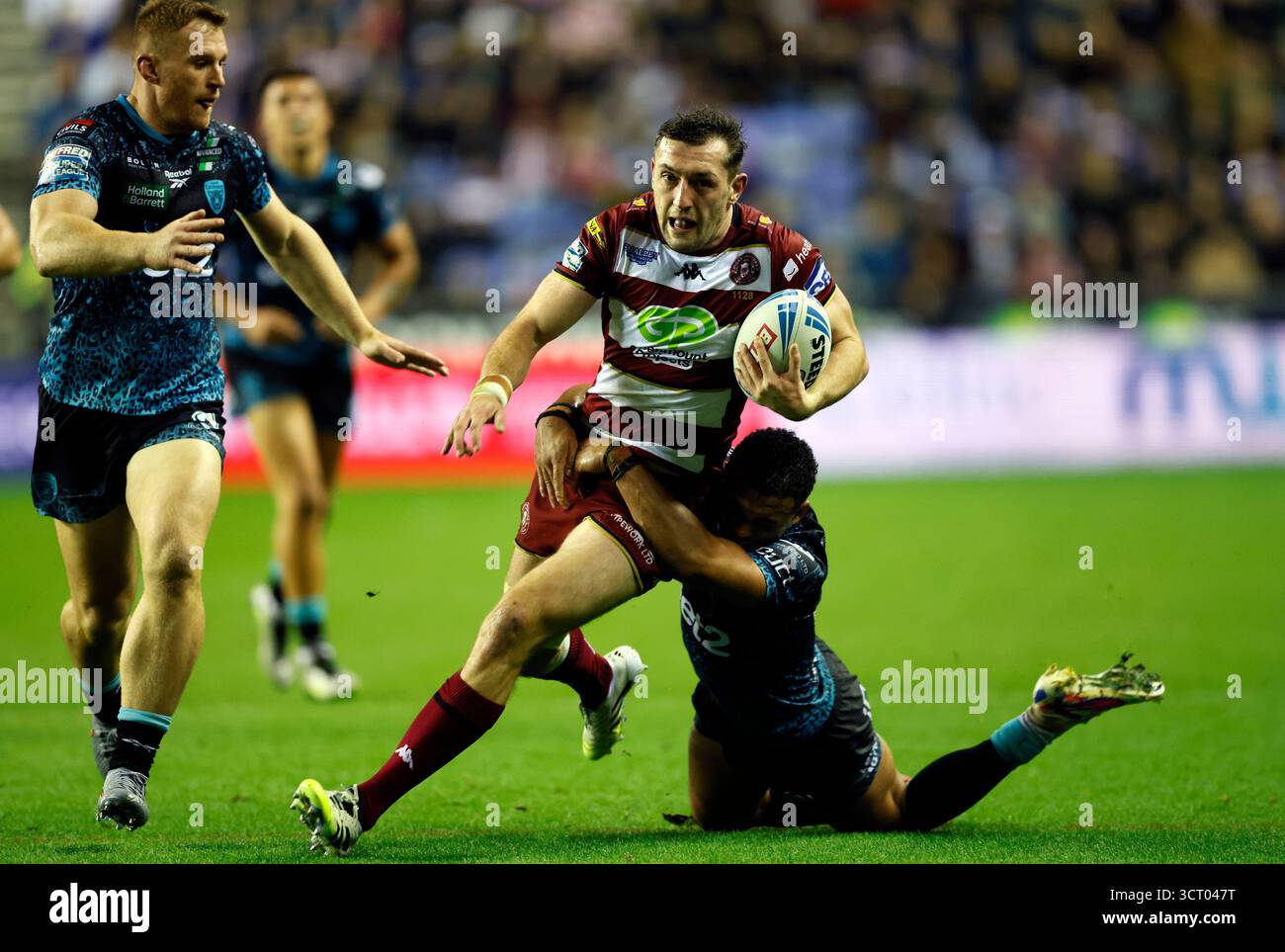 Wigan Warriors' Jake Wardle is tackled during the Betfred Super League play-off, semi final ...