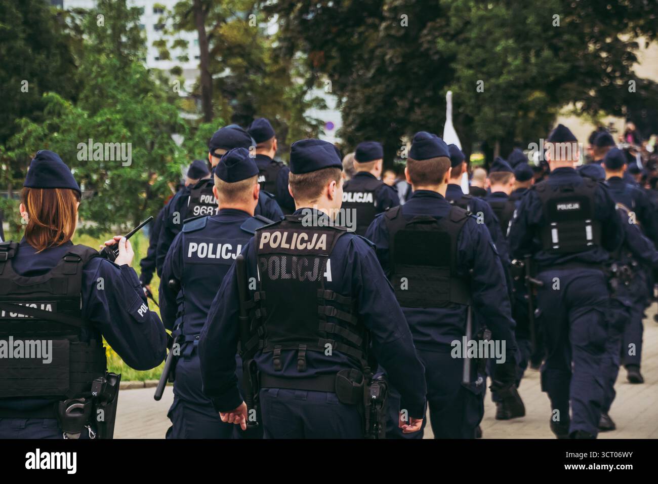Group of Polish police officers in navy uniforms and tactical gear ...