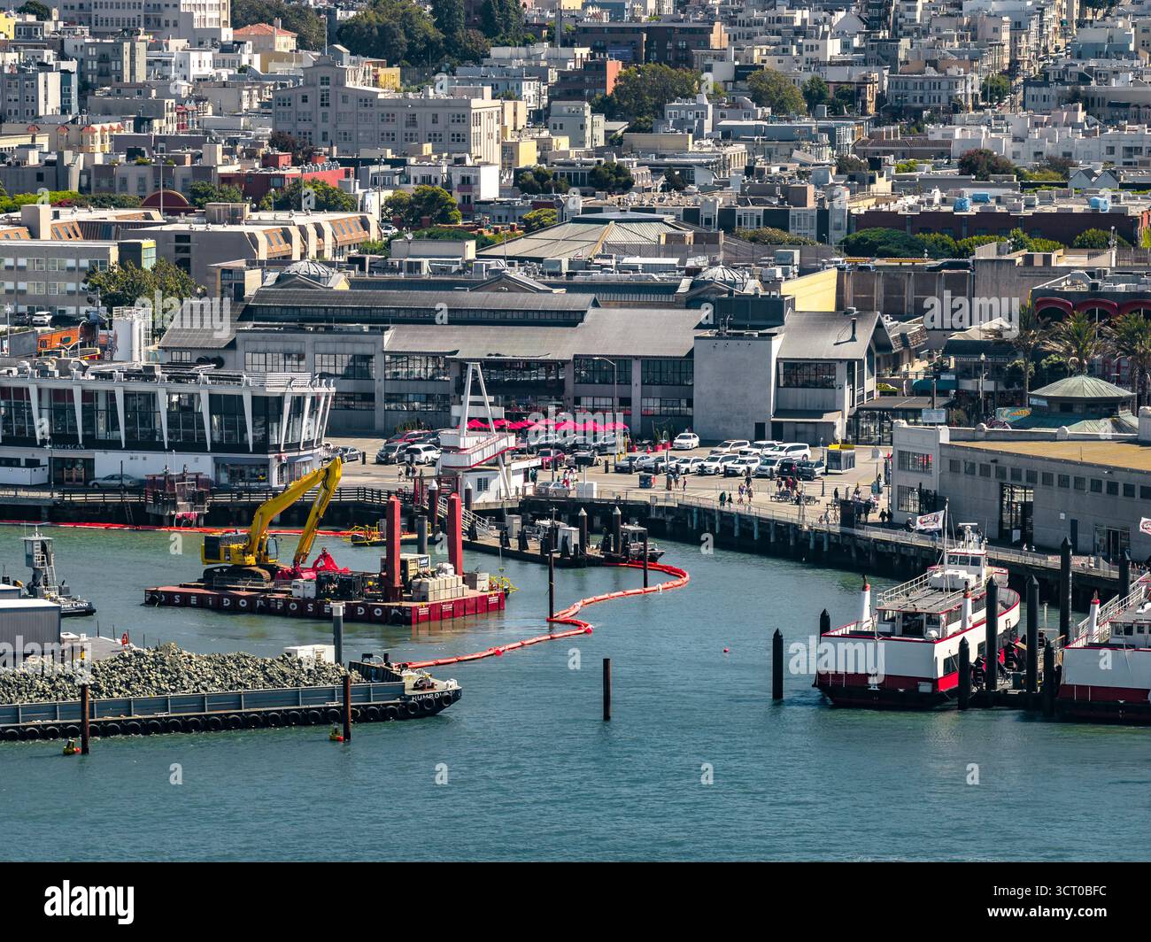 Waterfront Scene in San Francisco with Ferry and Construction Barge ...