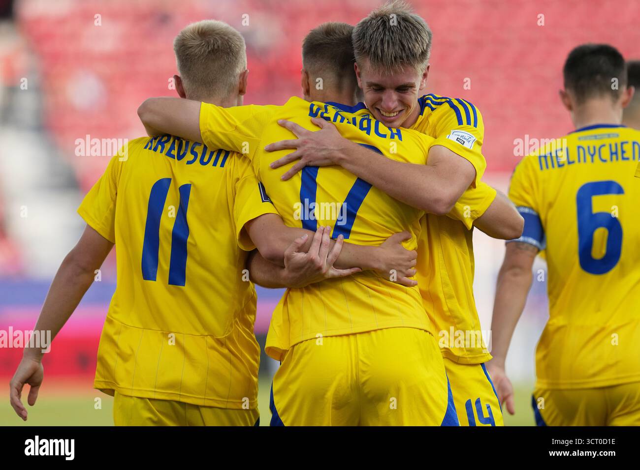 Ukraine's Maksym Derkach, center, is congratulated after scoring his ...