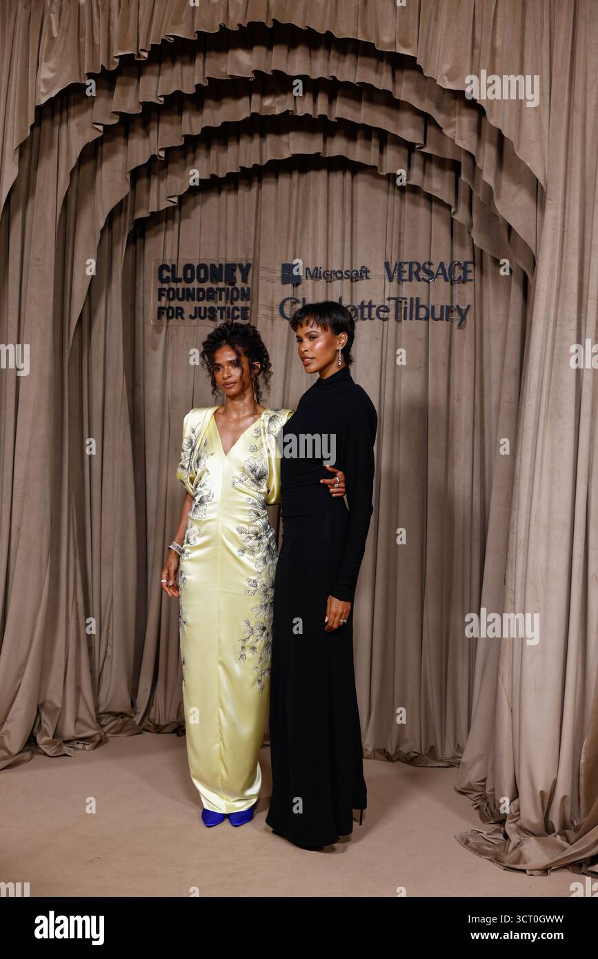 Ramla Ali, left, and Sabrina Dhowre Elba pose for photographers upon ...