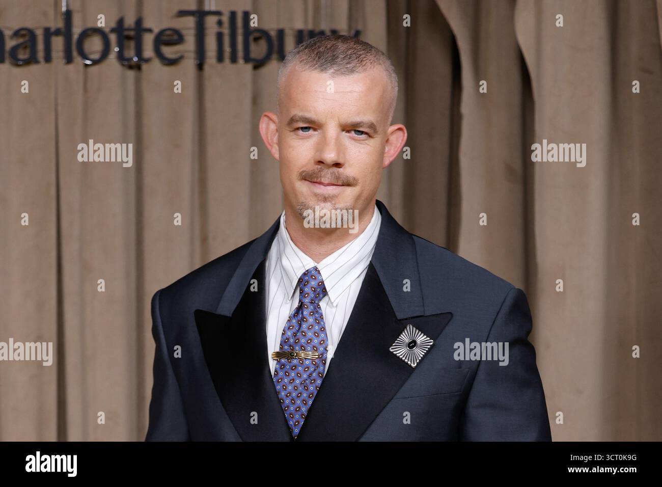 Russell Tovey poses for photographers upon arrival at The Albies on ...