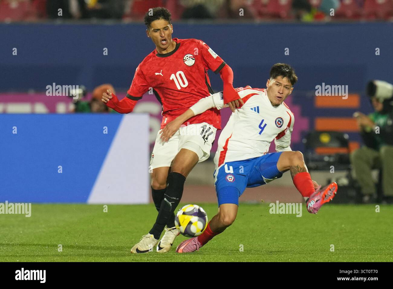 Egypt's Mohamed Abdallah, left, and Chile's Patricio Romero vie for the ...