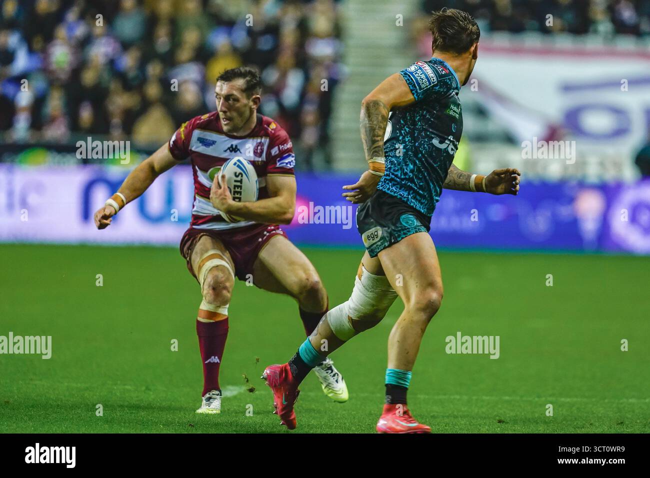 WIGAN, ENGLAND - October 3: Jake Wardle of Wigan Warriors looking for a ...