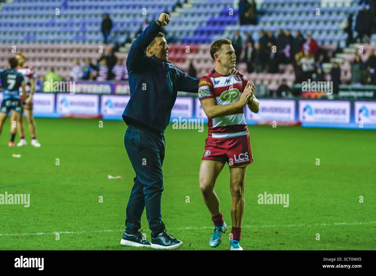WIGAN, ENGLAND - October 3: Jai Field of Wigan Warriors and Matt Peet ...