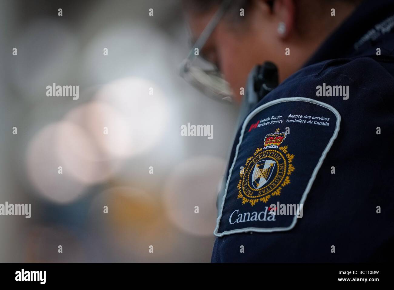 A Canada Border Services Agency patch is seen on the uniform of a CBSA ...