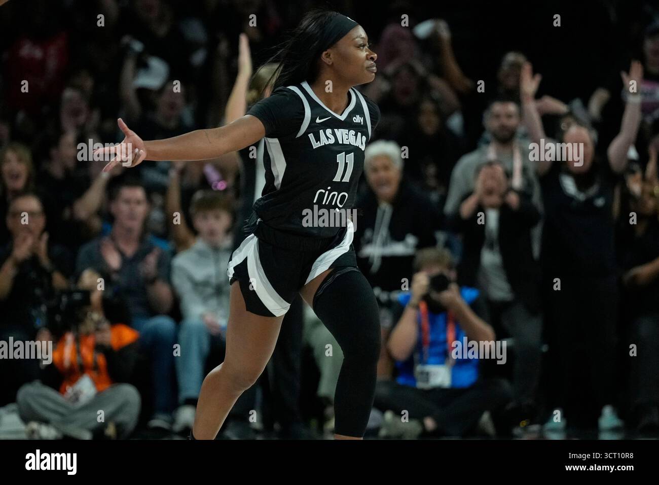 Las Vegas Aces guard Dana Evans (11) celebrates a three pointer against ...