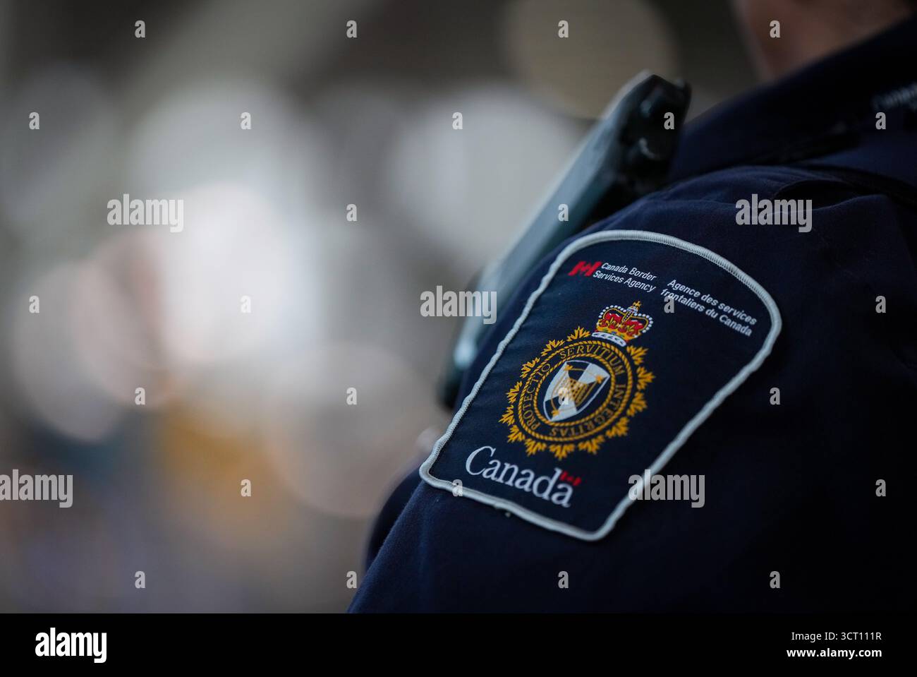 A Canada Border Services Agency patch is seen on the uniform of a CBSA ...