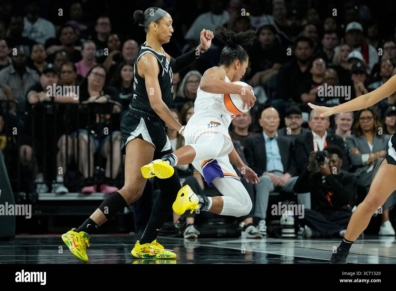 Phoenix Mercury forward Alyssa Thomas falls as Las Vegas Aces center A ...