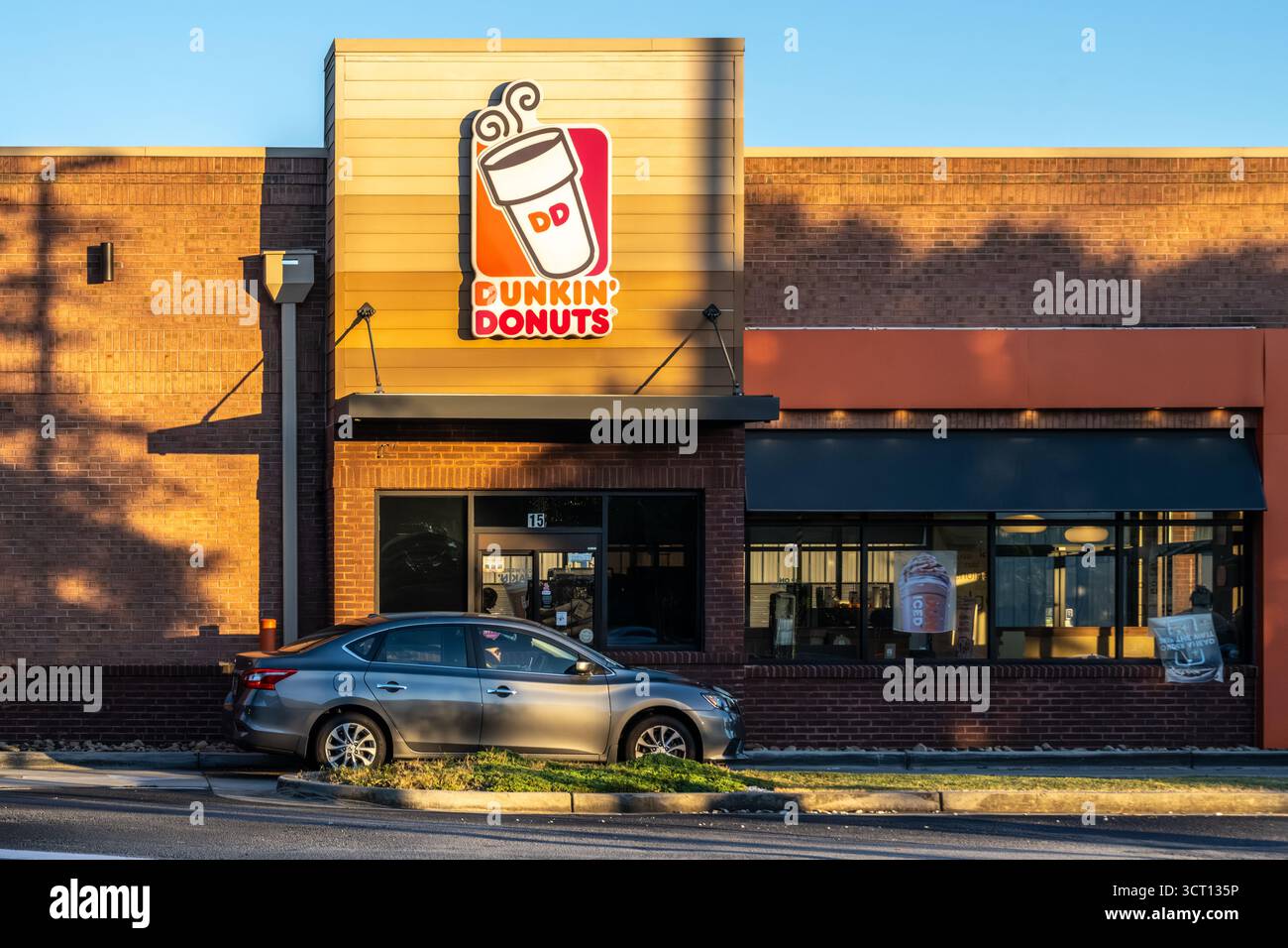 Dunkin' Donuts drive-thru at sunset in Grayson, Georgia. (USA Stock ...